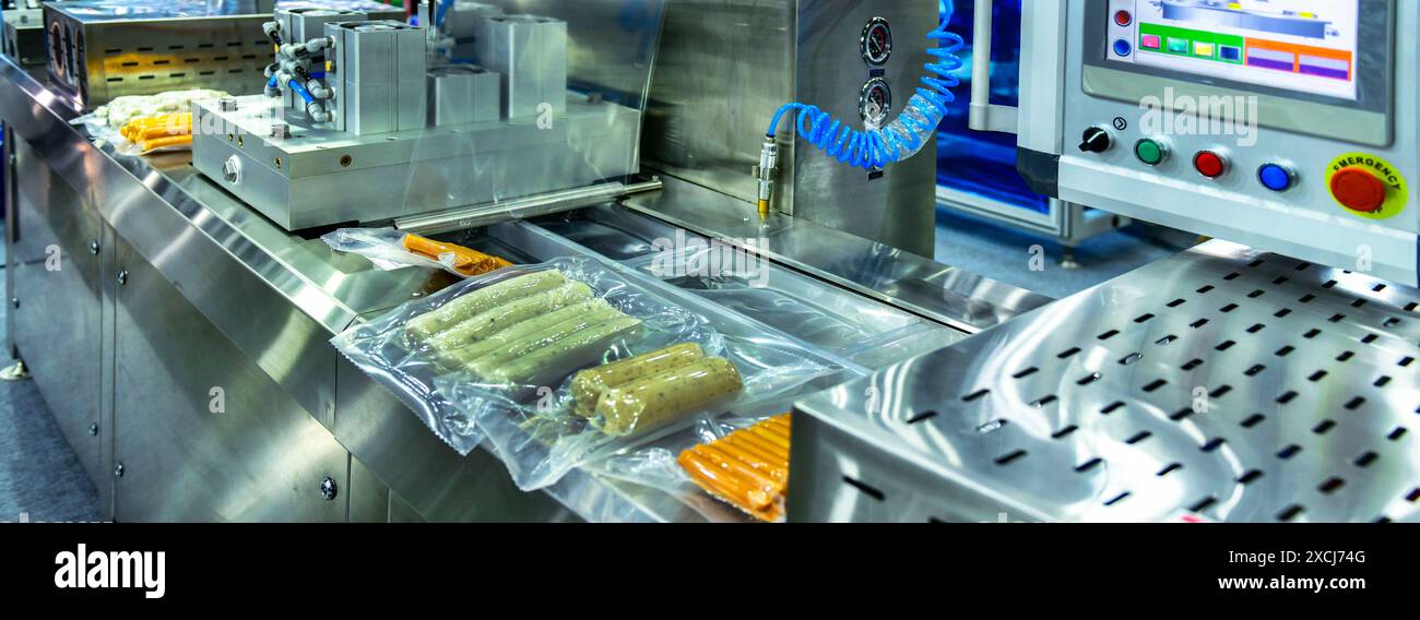 High-performance machines are wrapping processed fresh food products, pork, sausages.food ...