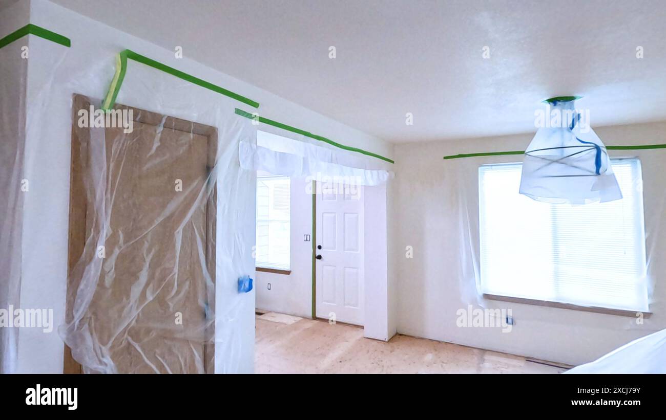 Interior Home Renovation with Protective Plastic Covering and Masking ...