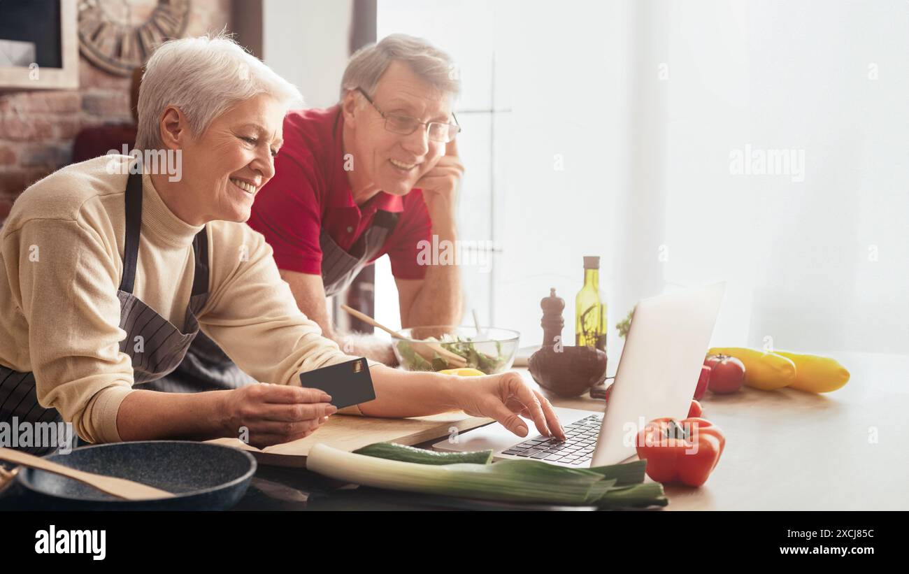 Senior Couple Cooking Together in a Modern Kitchen, Order Grocery Stock ...