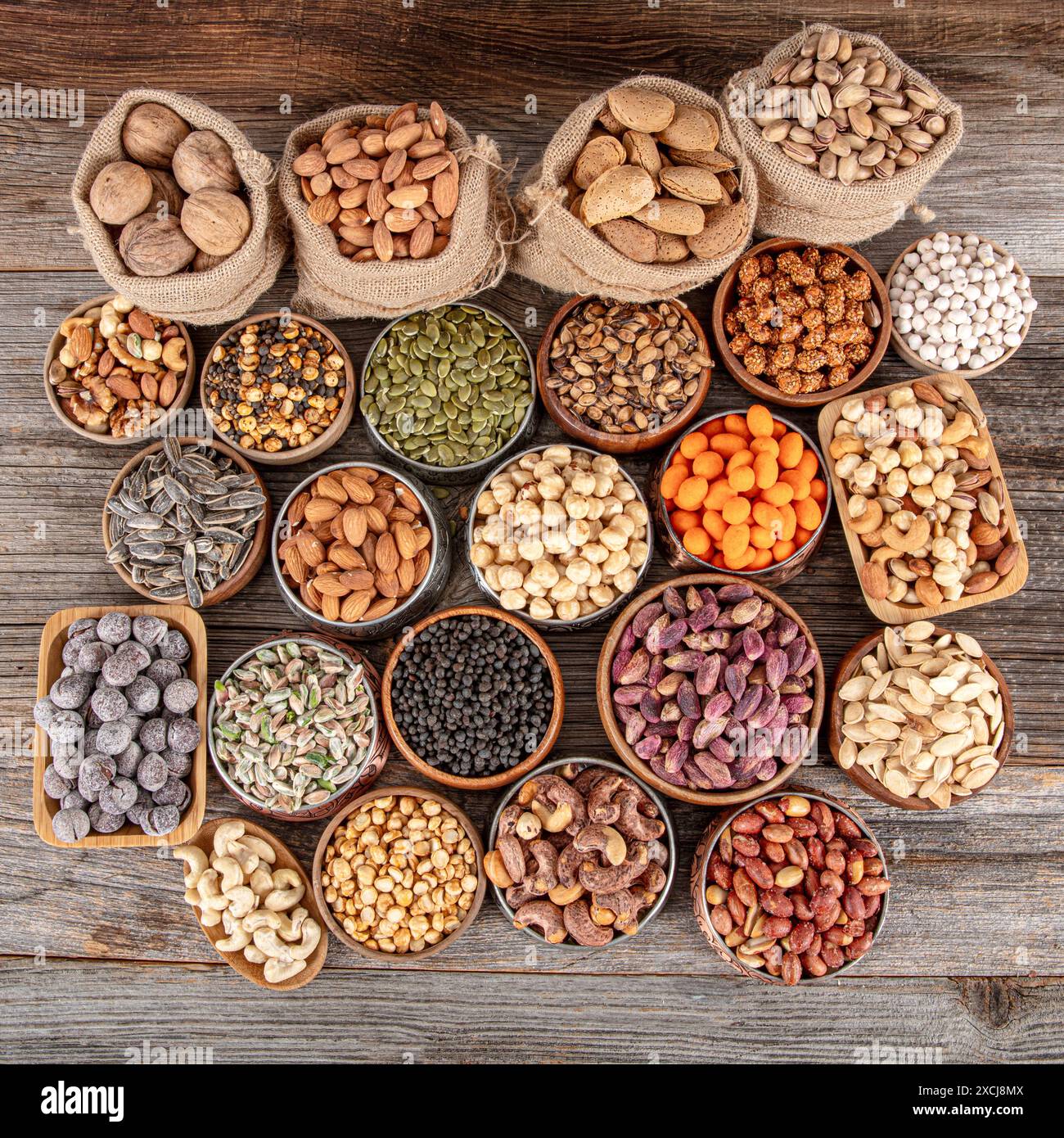 Assorted nuts and seeds background. mixed raw food for snacking, top ...