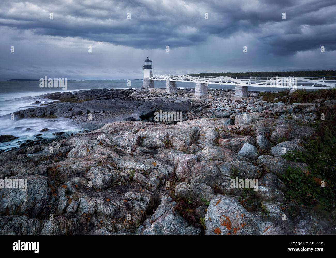 Marshall Point Lighthouse and colorful rocks. Maine Stock Photo - Alamy