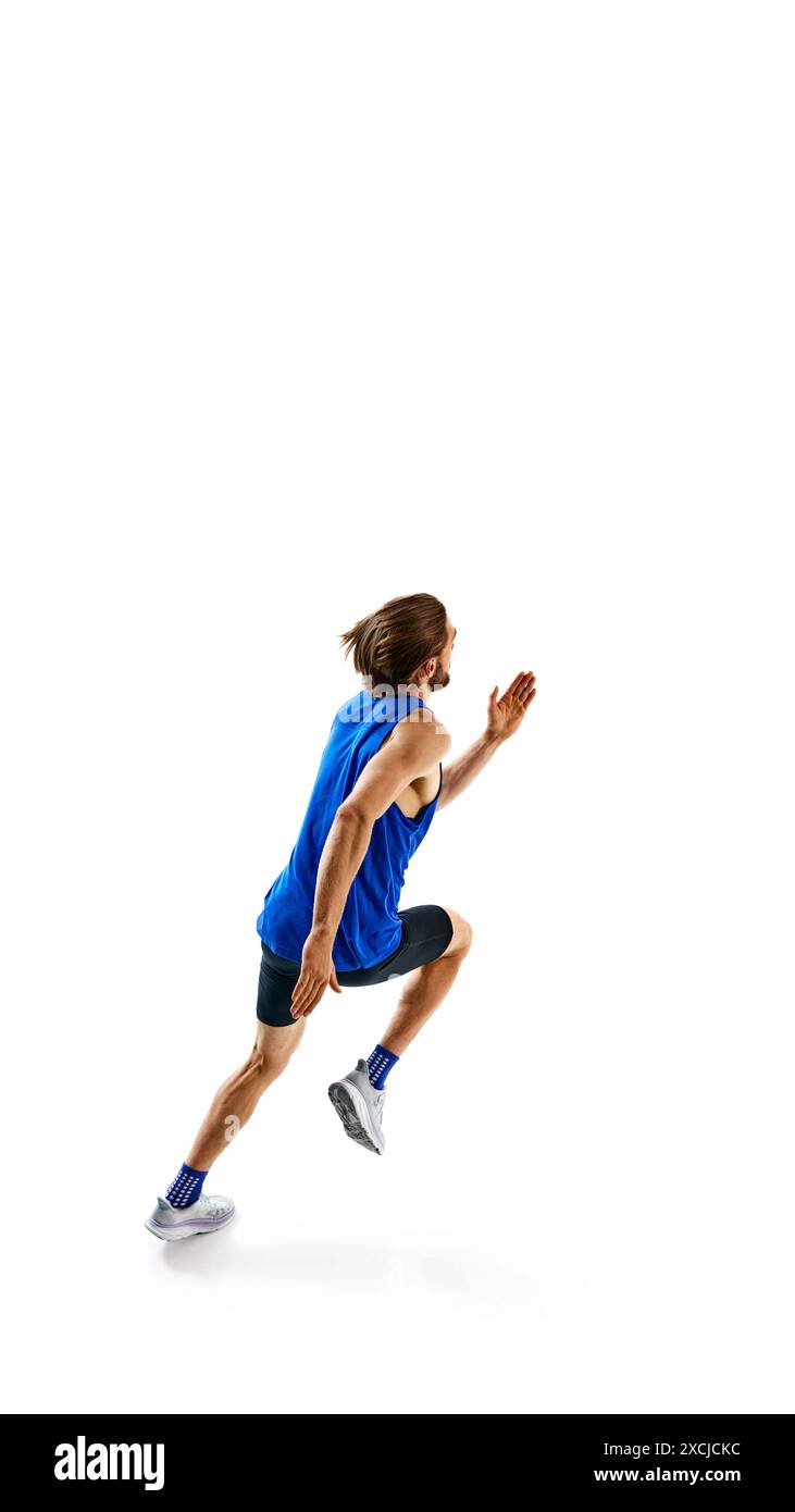 Capturing spirit of sport. Competitive and focused man, running athlete ...