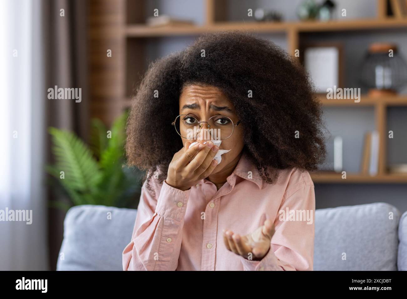 Sad african woman crying camera hi-res stock photography and images - Alamy