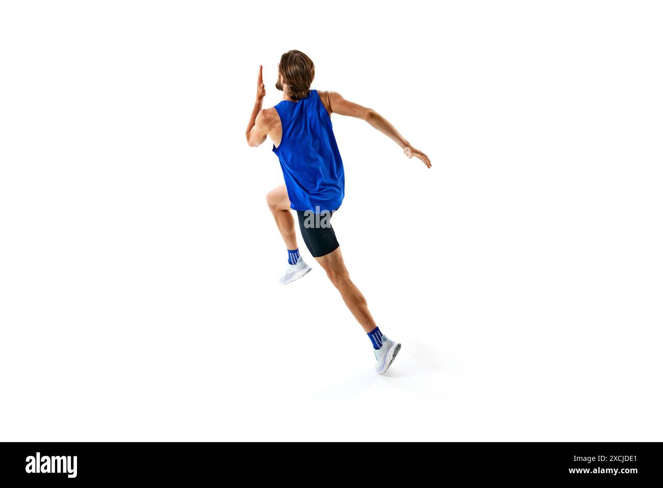 Athletic and determined man, runner in motion, training, growing speed ...