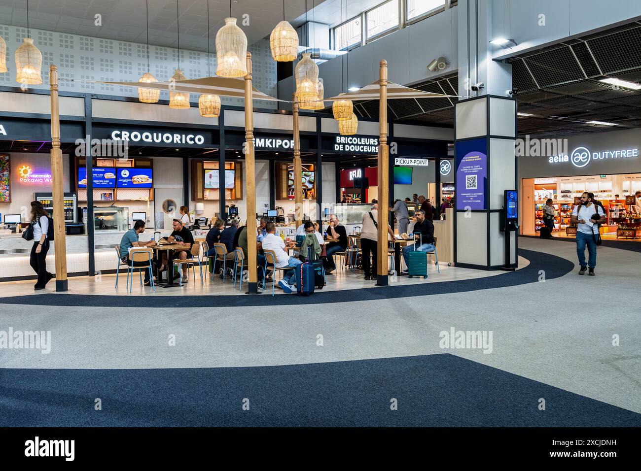 Passengers in Marseille-Provence airport. The new Terminal 1 at ...