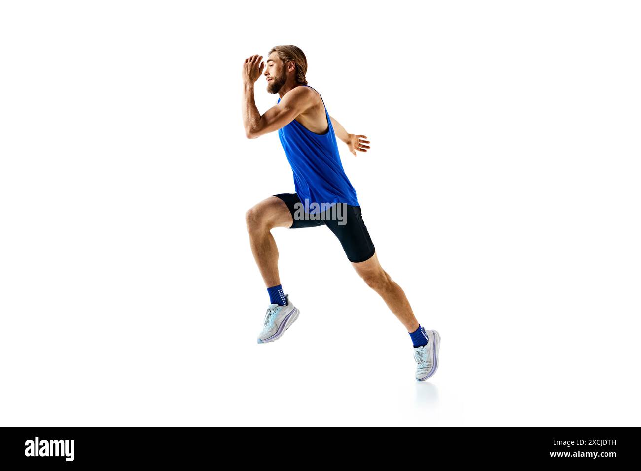 Focused and motivated young man, competitive athlete in motion, running ...