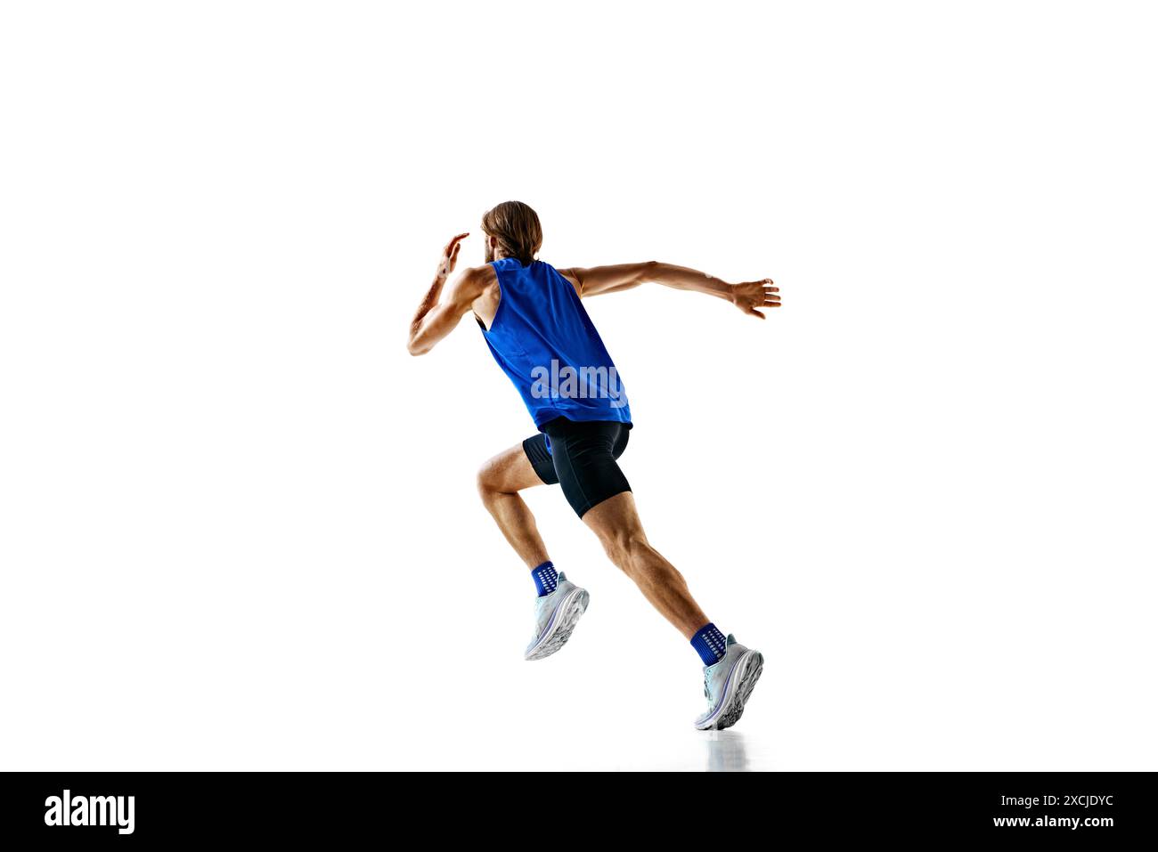 Focused and motivated young man, competitive athlete in motion, running ...