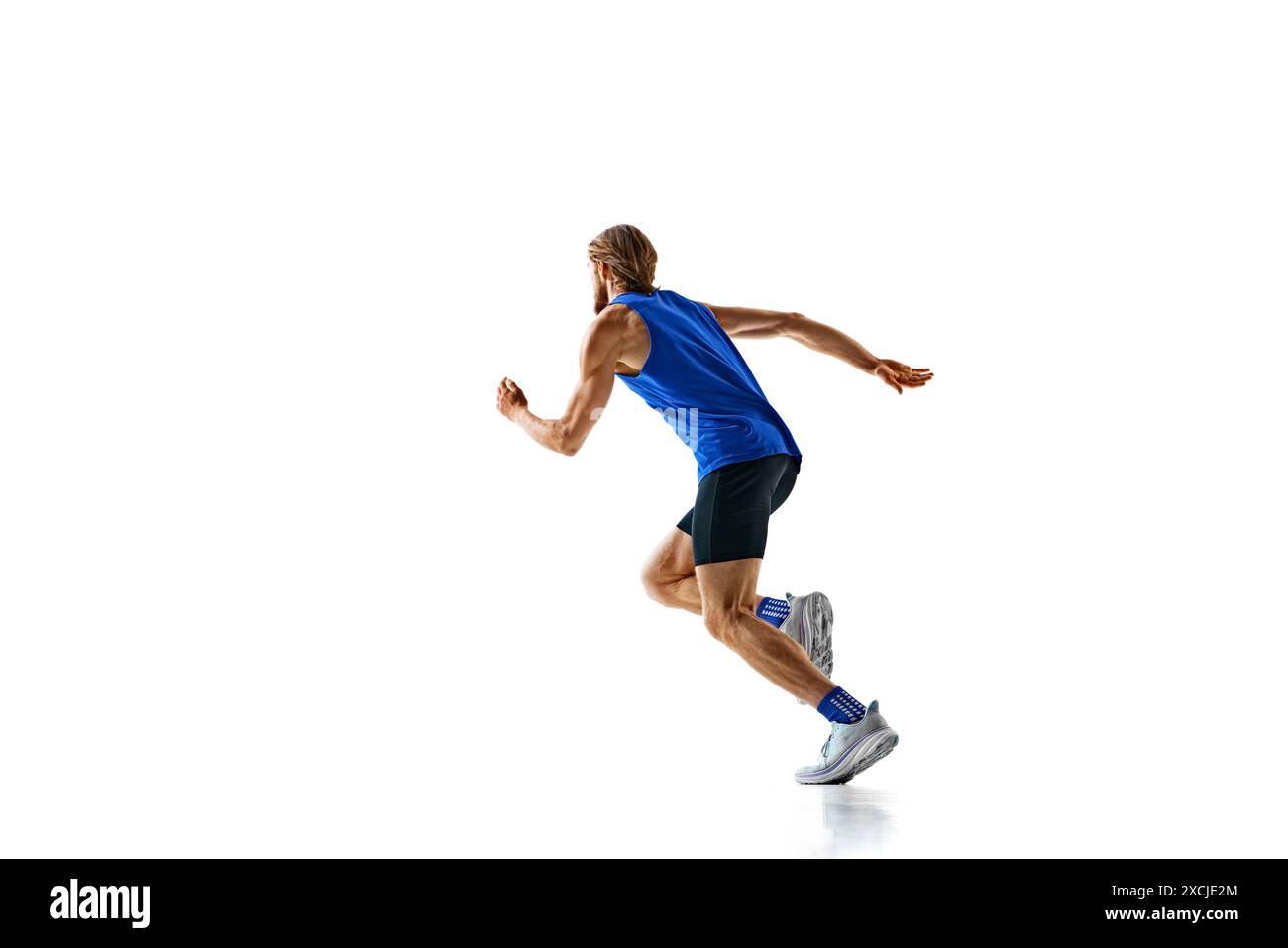 Dynamic image of man in a run, runner in motion, training isolated on ...