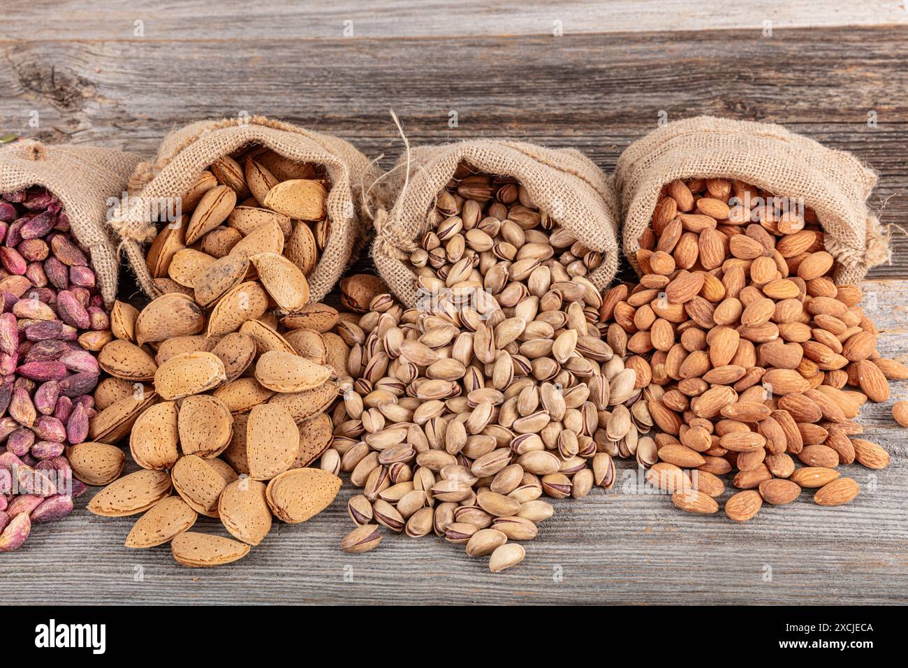 Assorted nuts and seeds background. mixed raw food for snacking, top ...