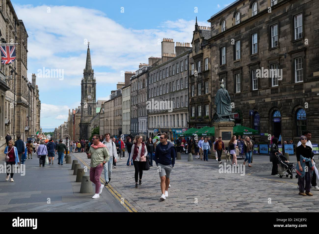 Edinburgh Scotland, UK 17 June 2024. Tourist on the Royal Mile. credit ...