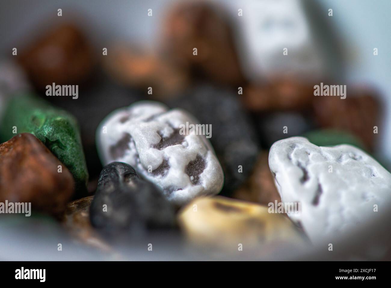 Macro photo of colorful pebble chocolates, showcasing the vibrant ...