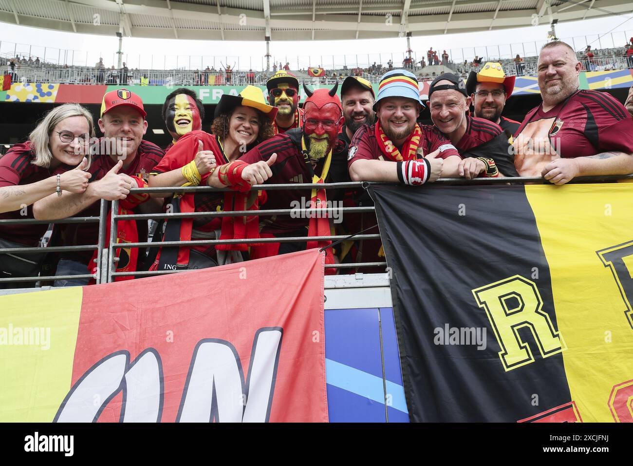 Red devils fan Olivier Didion and Belgian fans and supporters pictured ...
