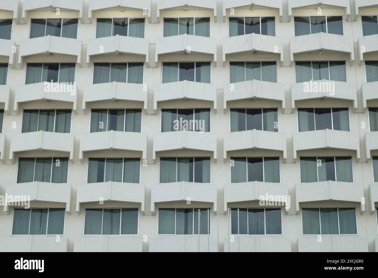 Window pattern on old architectural style building Stock Photo - Alamy