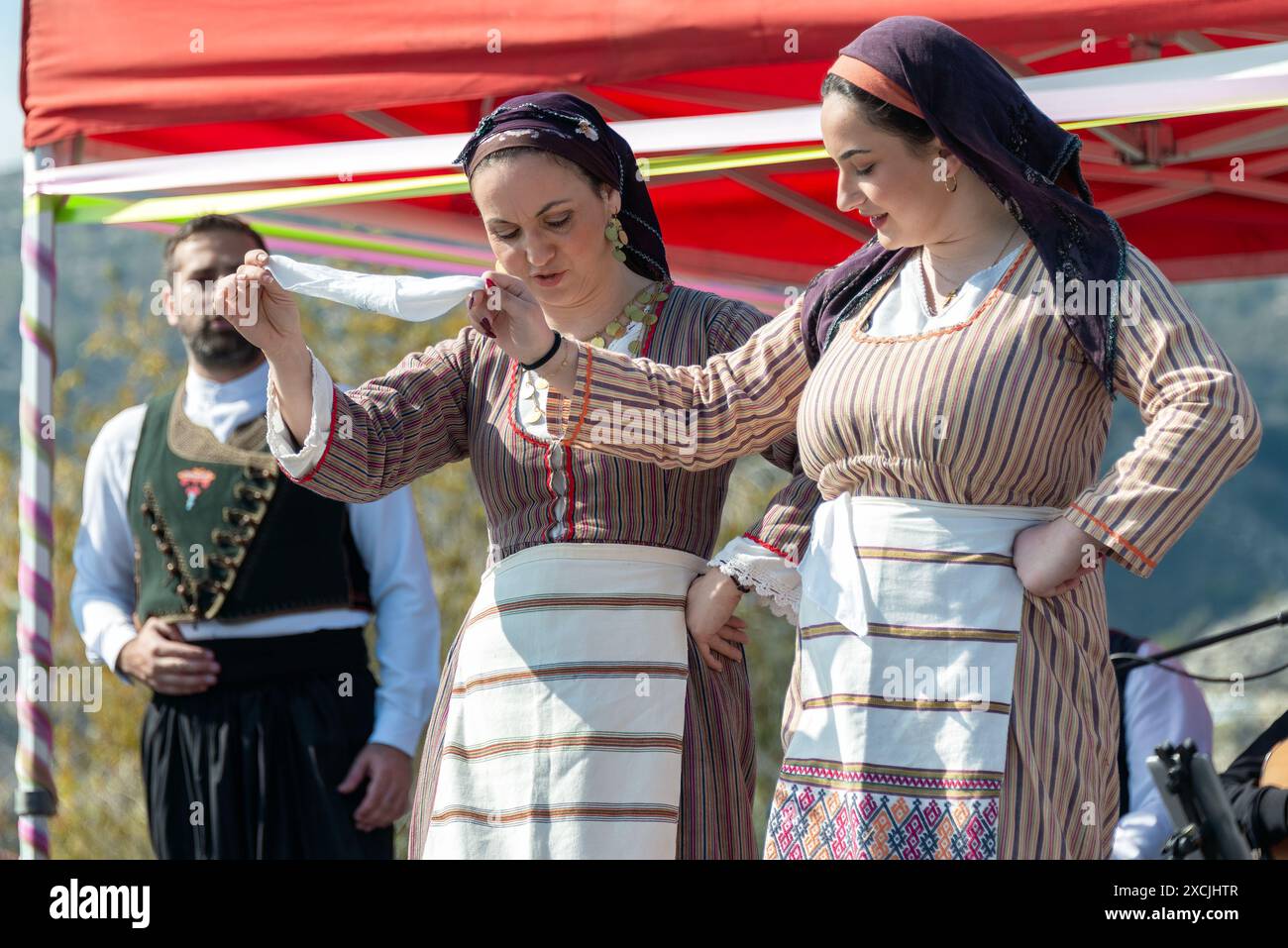 Limnatis, Cyprus - December 24, 2022: Two women wearing traditional ...