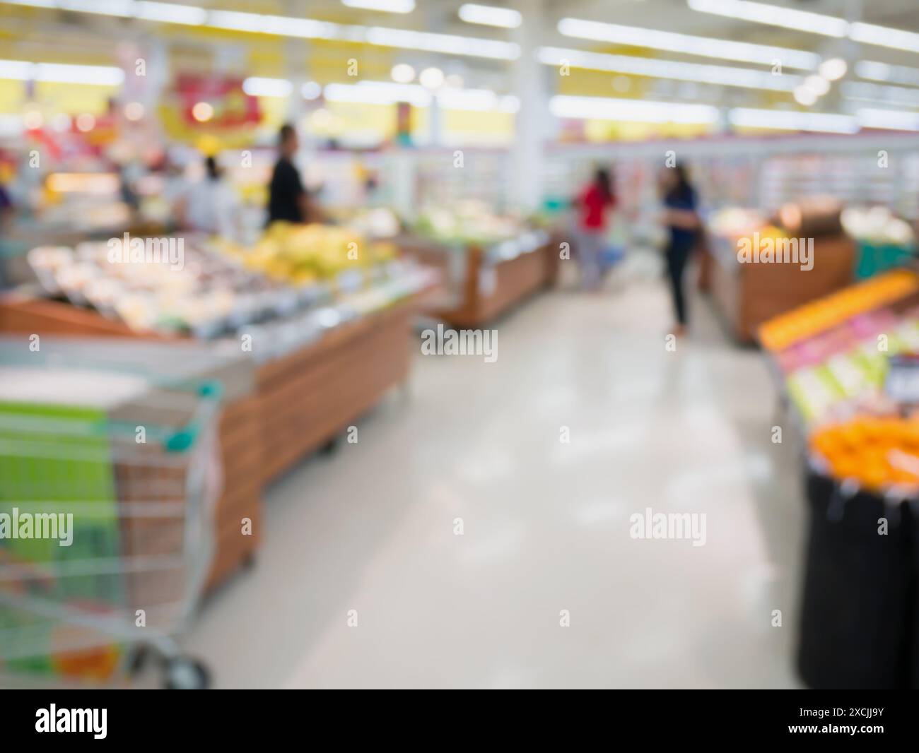 Grocery store blur background with customers Stock Photo - Alamy