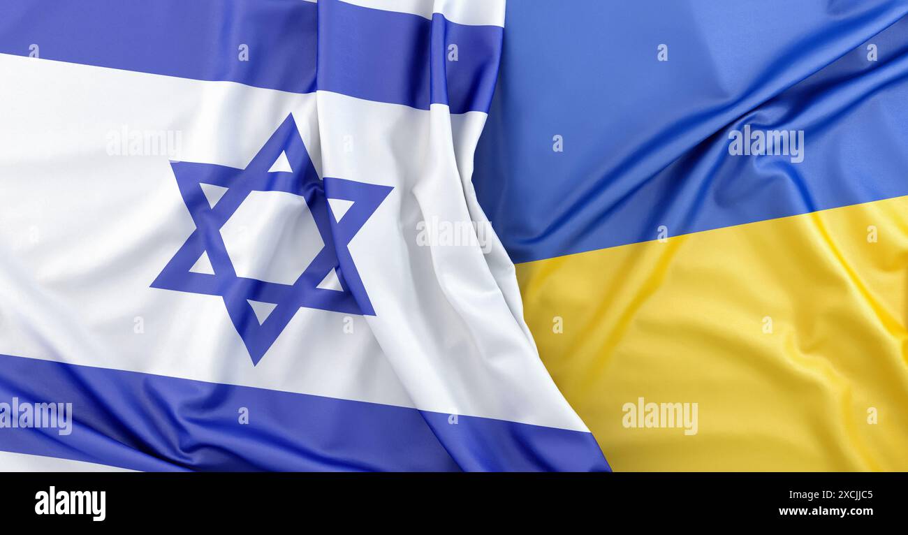 Fabric textures of the national flags of Israel and Ukraine are laying ...