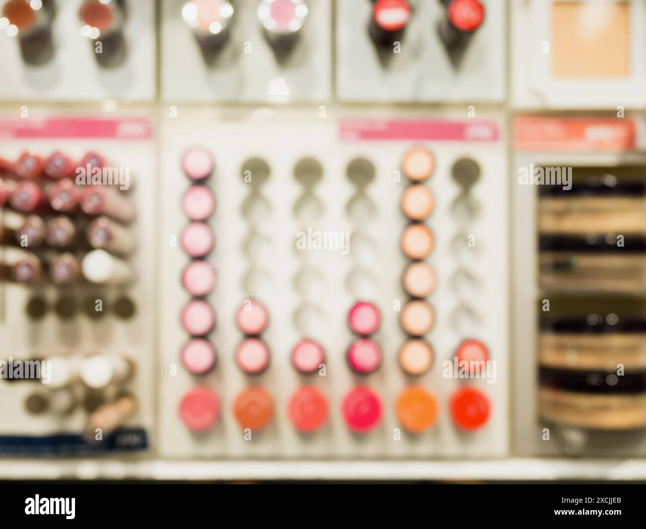 sets of makeup in cosmetics shop blur background Stock Photo - Alamy