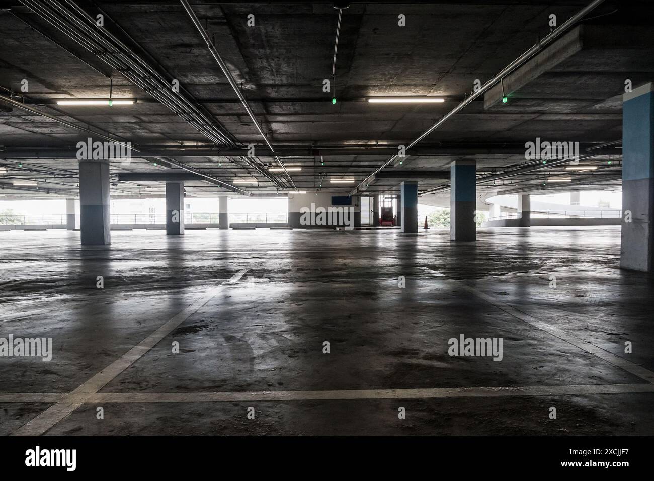 interior of empty vacant car parking garage space in shopping mall ...