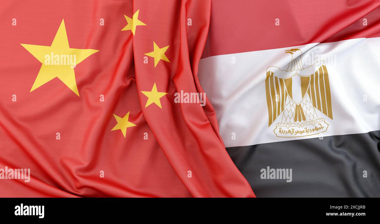 Fabric textures of the national flags of China and Egypt lying together ...