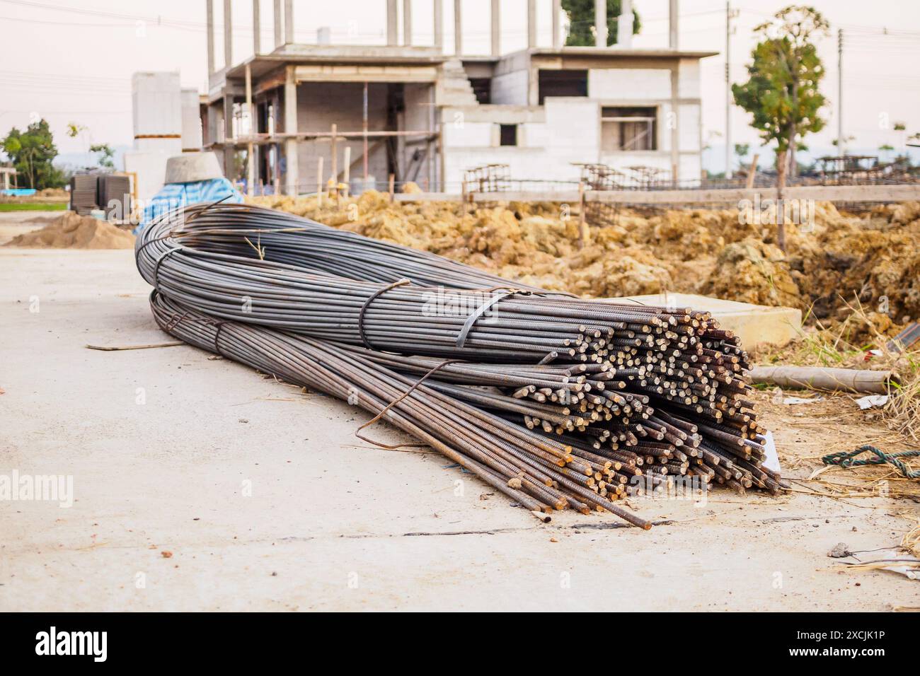 steel rebar for reinforcement concrete at construction site with house ...