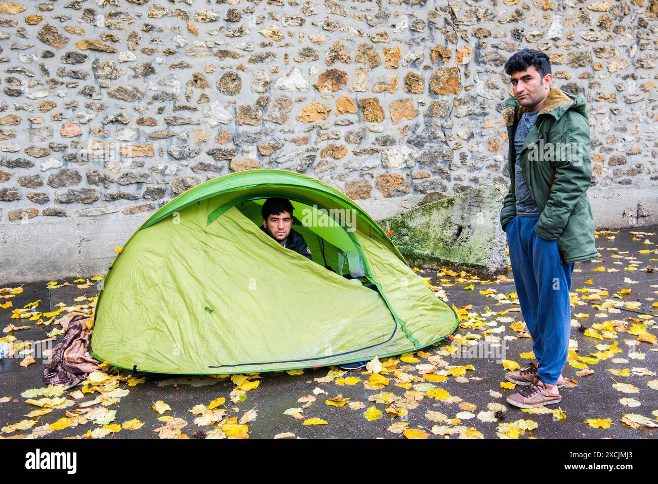 Refugee Migrants and their Tent Two Refugee Migrants living inside ...