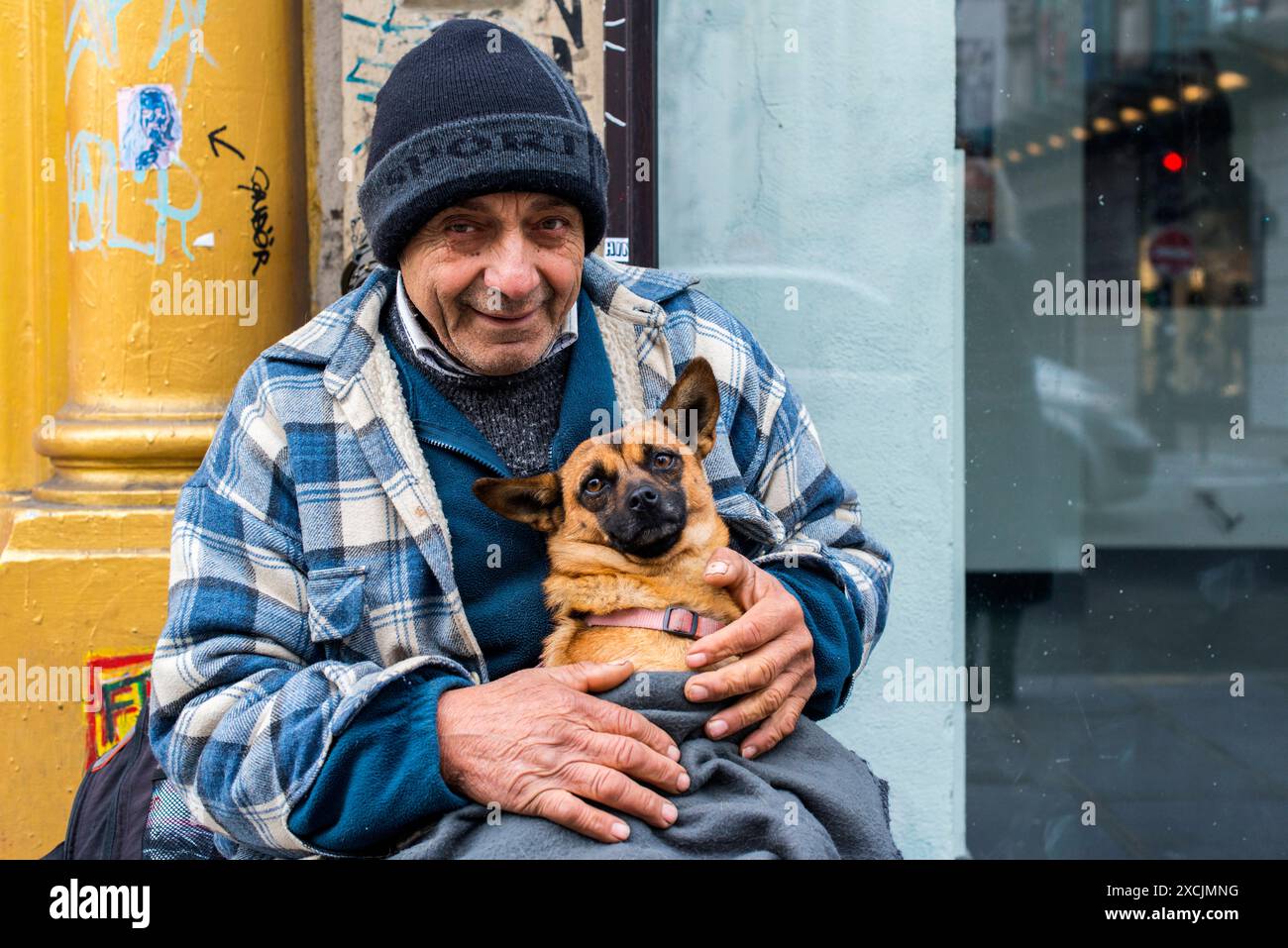 Homeless Man with Pet Dog Paris, France. Homeless man and his pet dog ...
