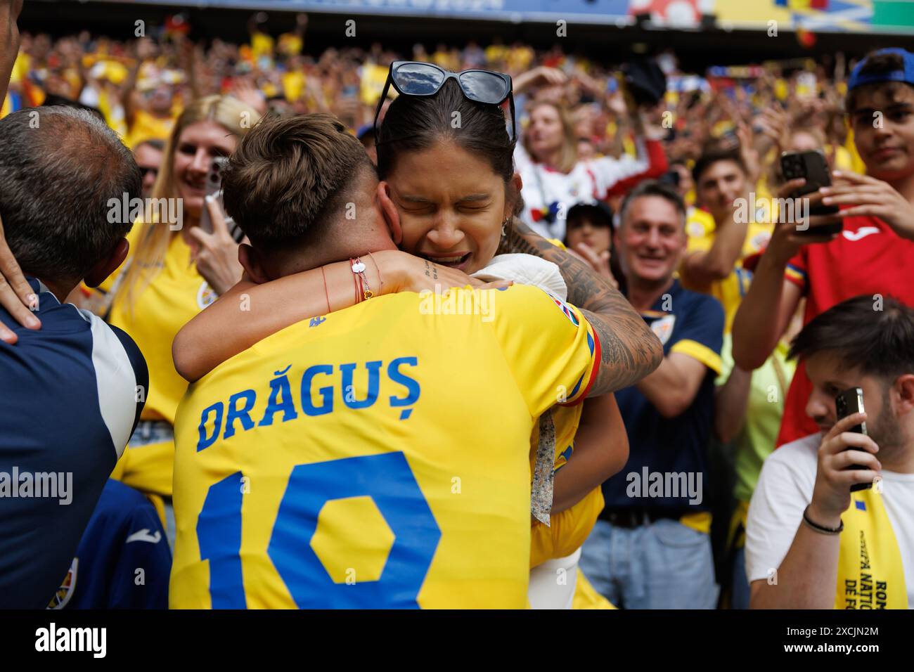 Denis Dragus with his wife during UEFA Euro 2024 game between national teams of Romania and ...