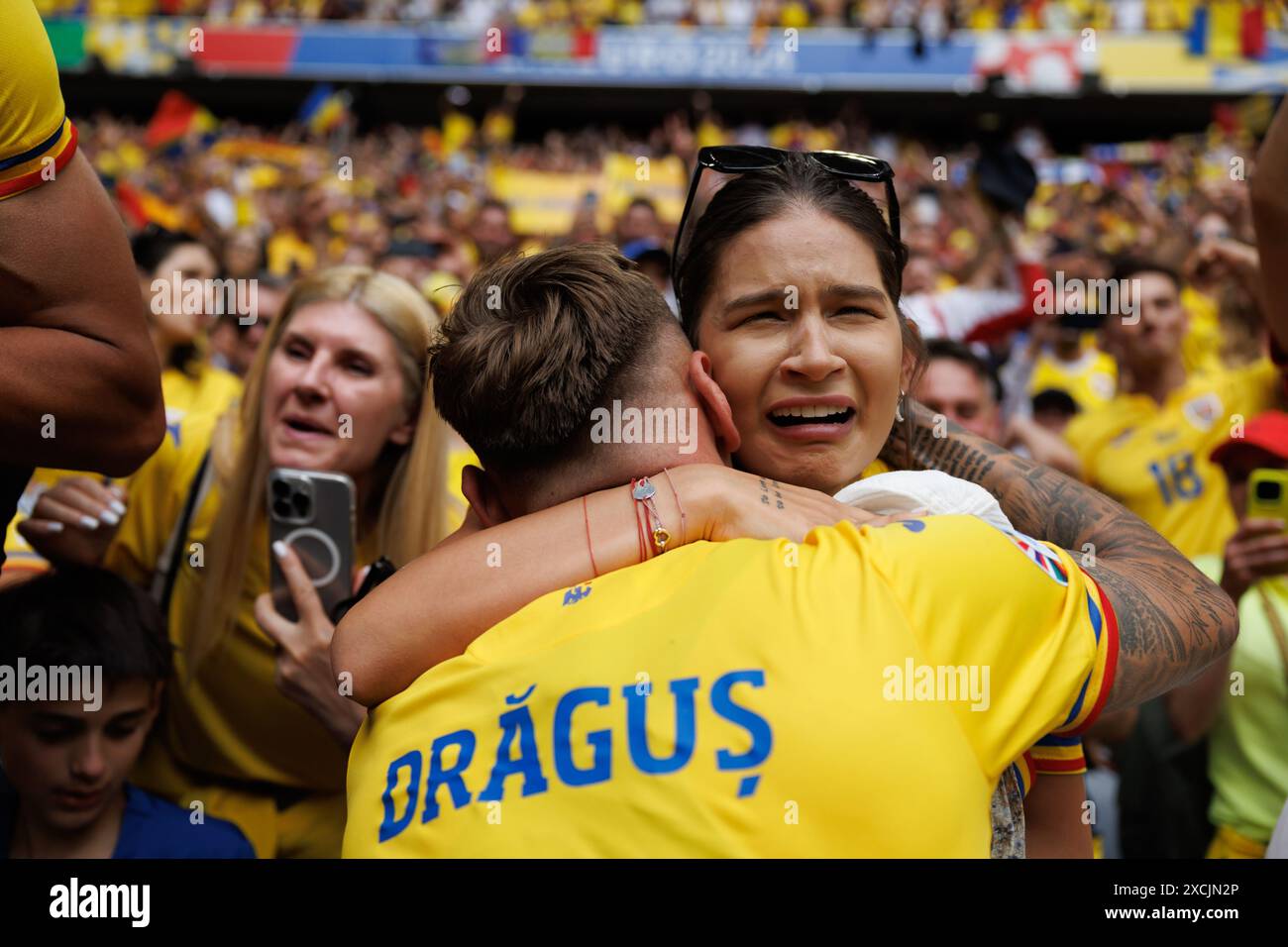Denis Dragus with his wife during UEFA Euro 2024 game between national teams of Romania and ...