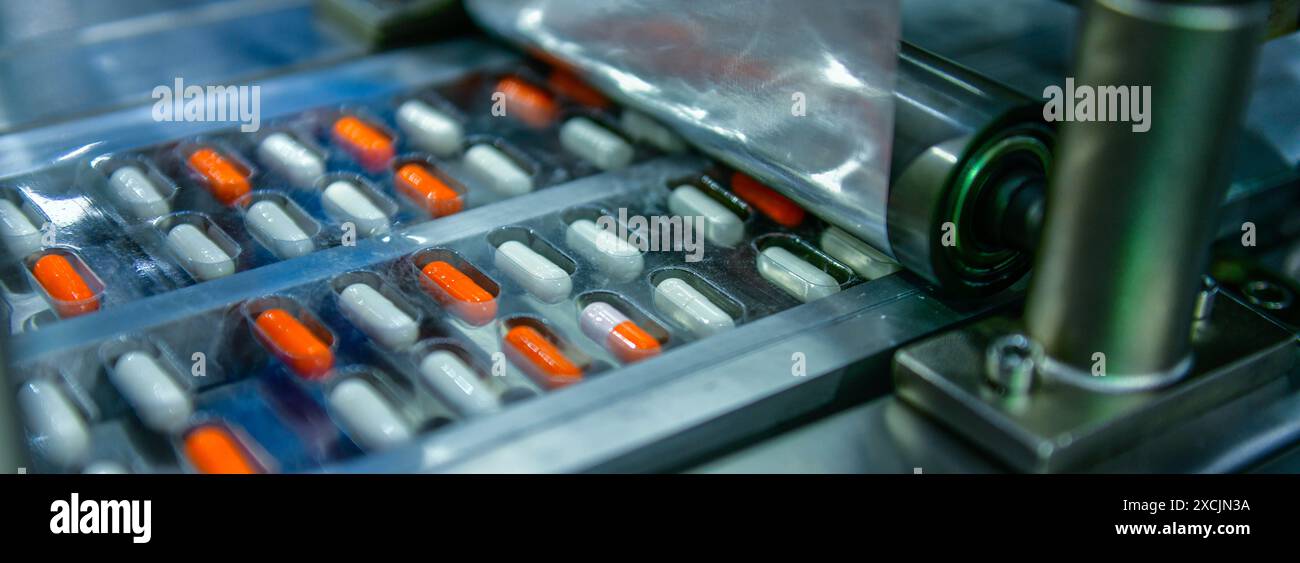 Capsule medicine pills during production line and packing process on ...