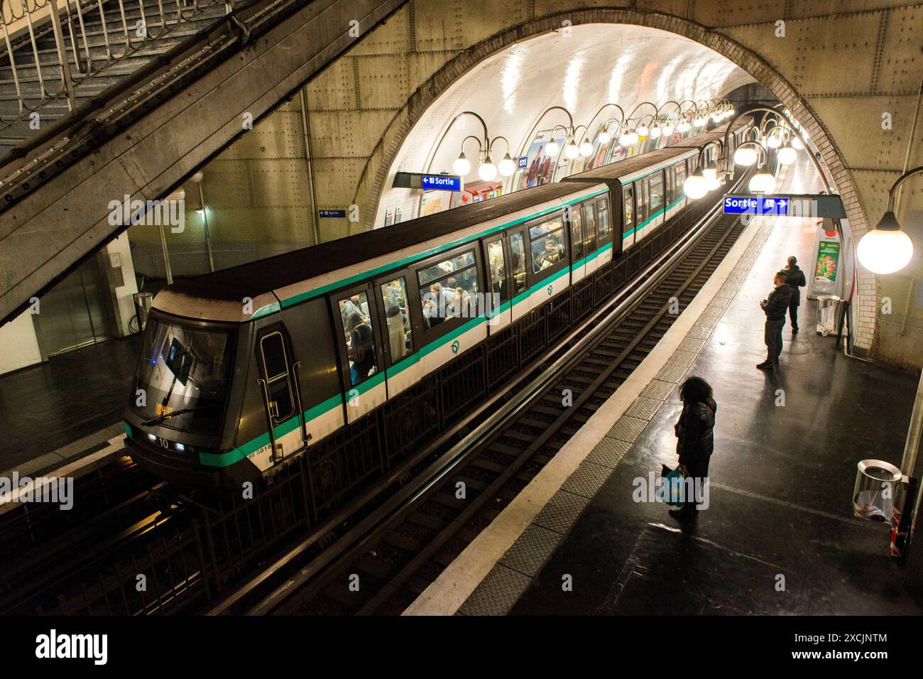 Subway Station Cite View on Cite Subway Station, platform and tracks from above stairs. Paris ...