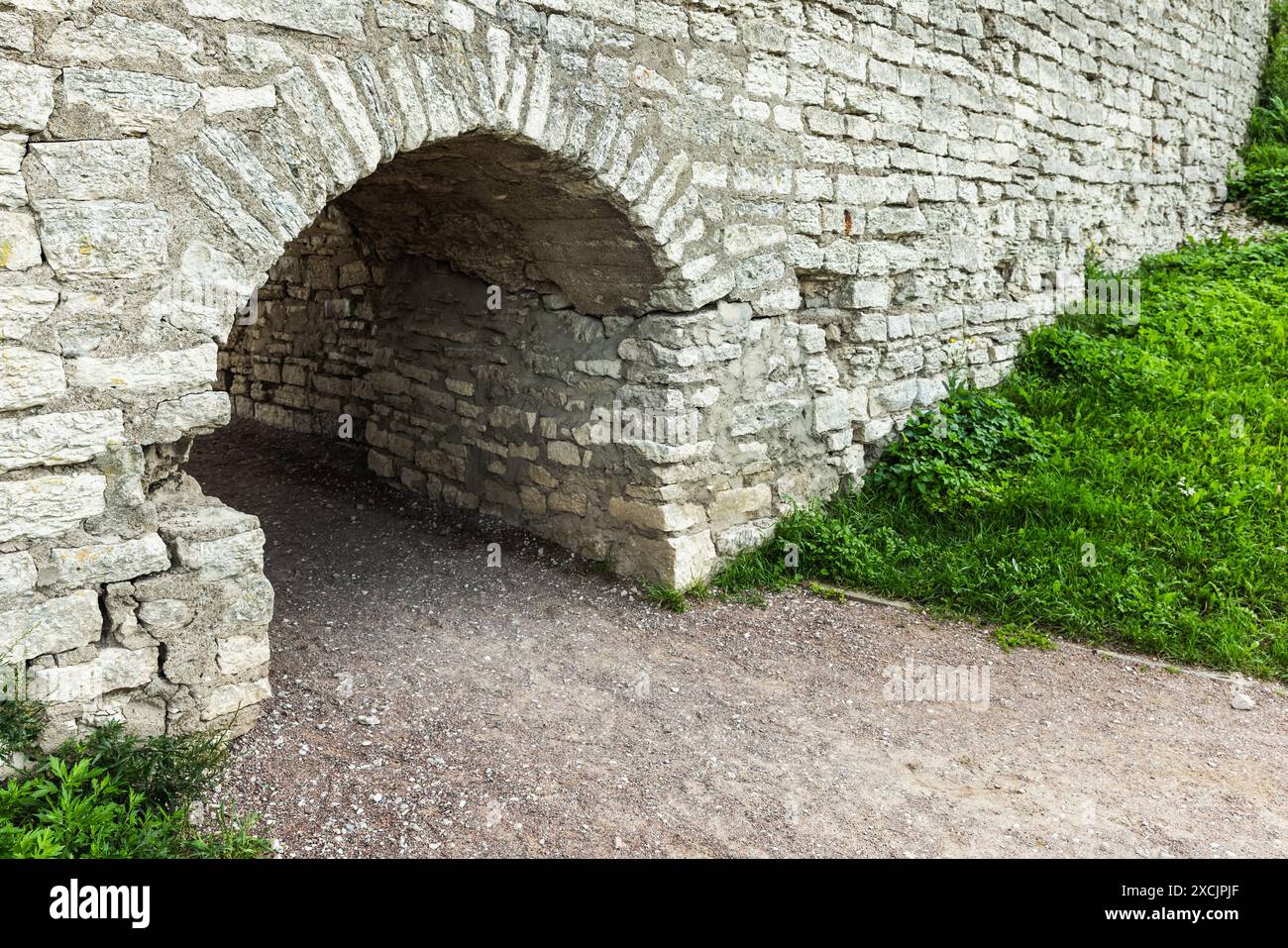 Stone fortress wall with an empty gateway. Kremlin of Pskov, Russia ...