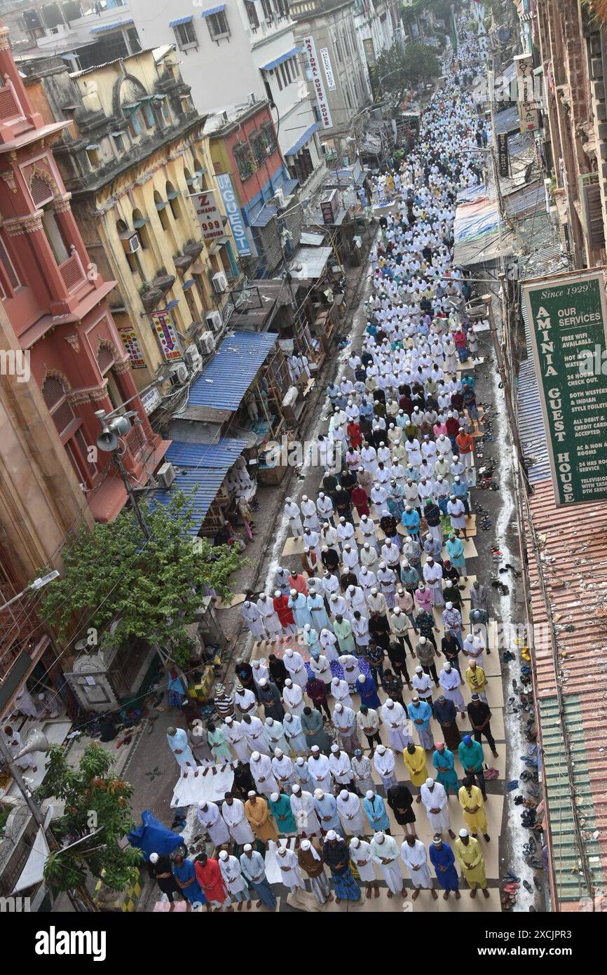 Kolkata, India. 17th June, 2024. Muslim devotees offer Eid al-Adha ...