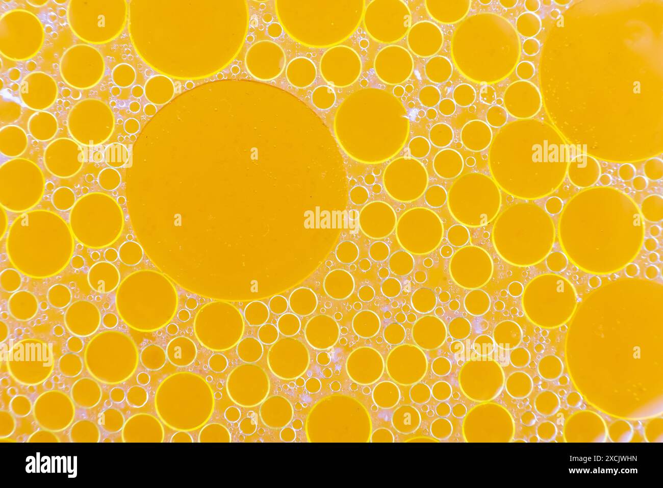 Texture of fat or oil with yellow bubbles. Background of fat bubbles ...