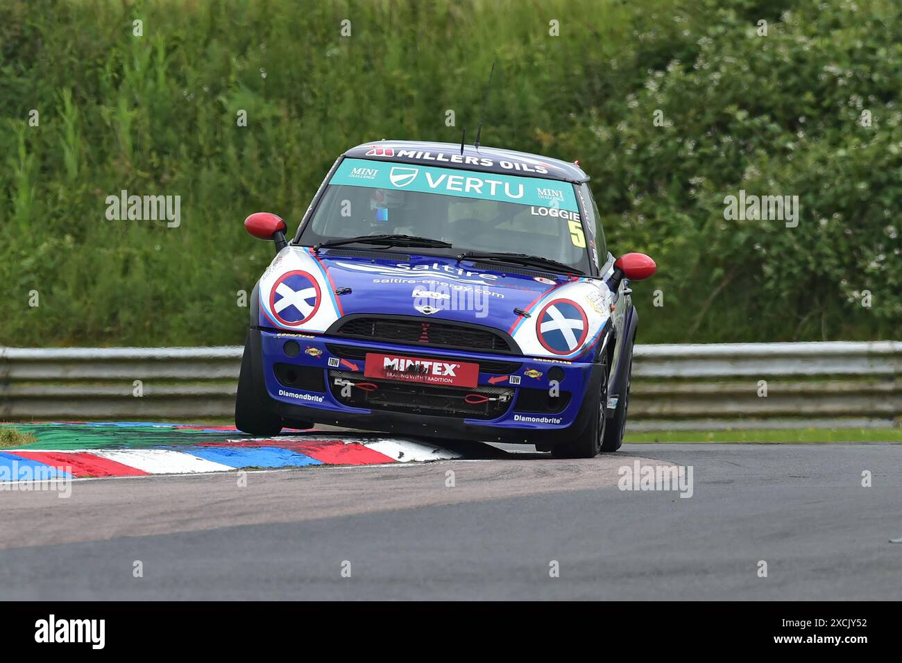 Riding the kerb rear wheel off the ground, Katia Loggie, MINI Cooper ...