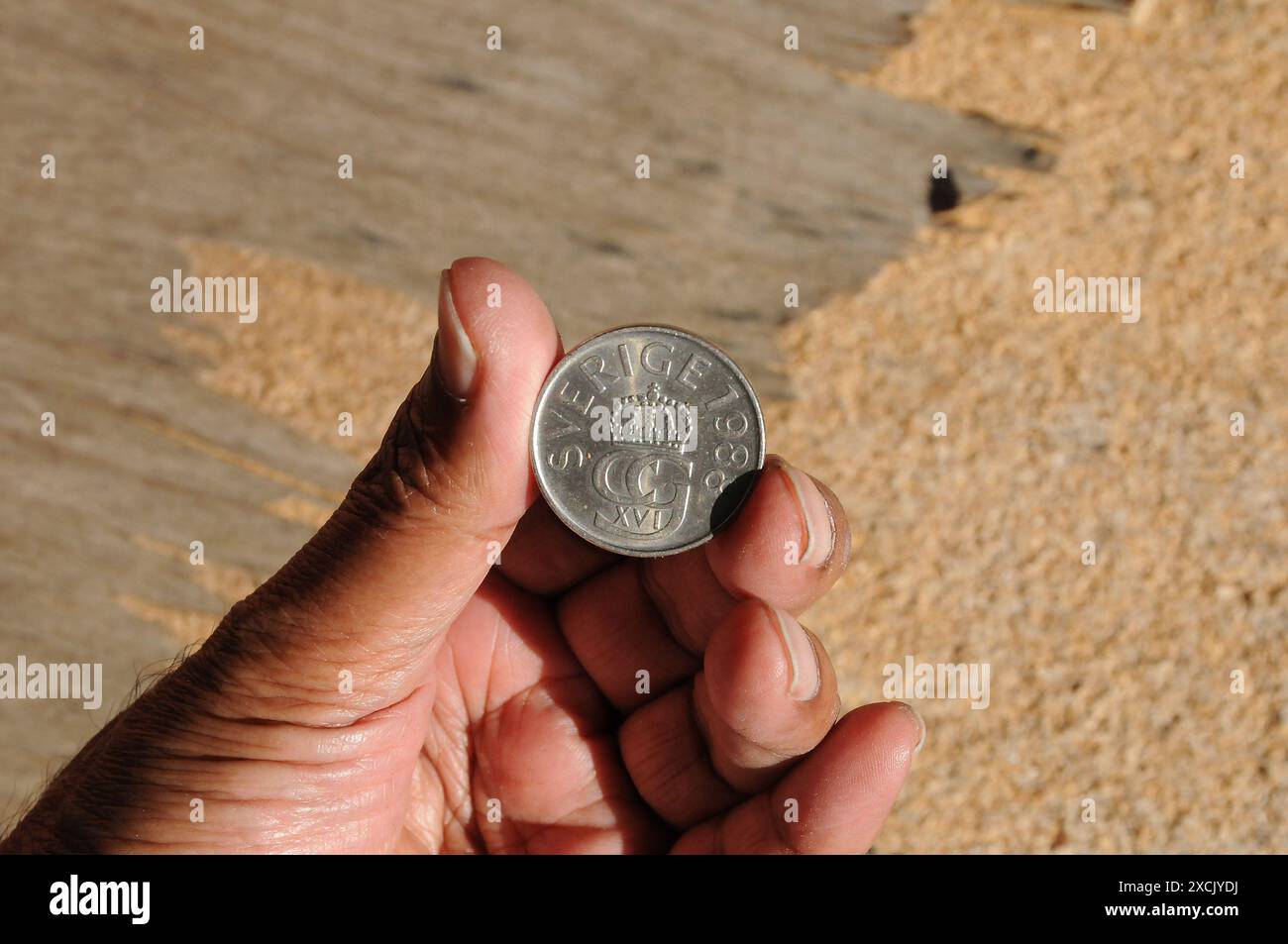 Copenhagen/ Denmark/17 JUNE 2024/Swedish coins kronor in danish capital ...
