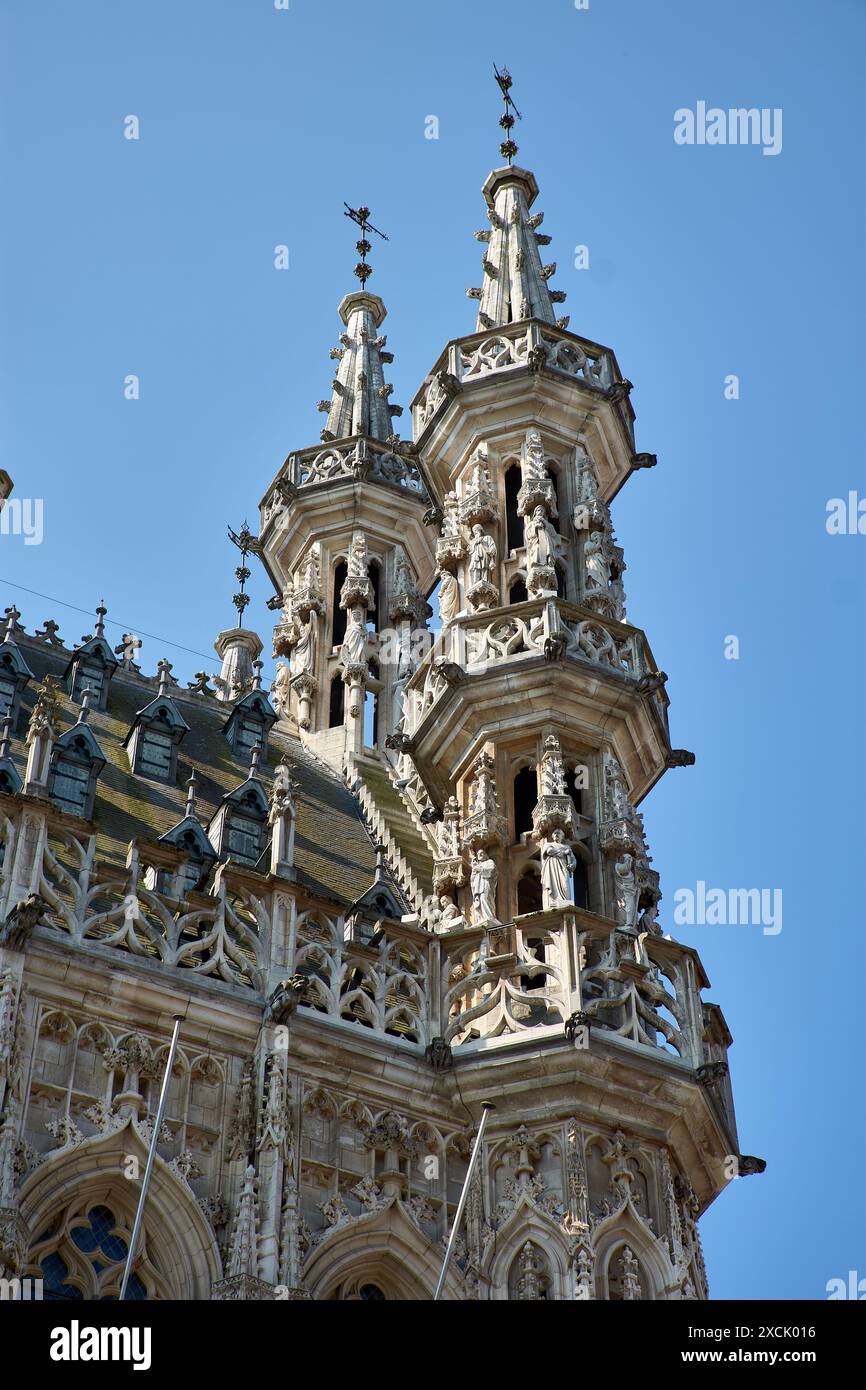 Detail of the medieval gothic architecture of the town hall in Leuven ...