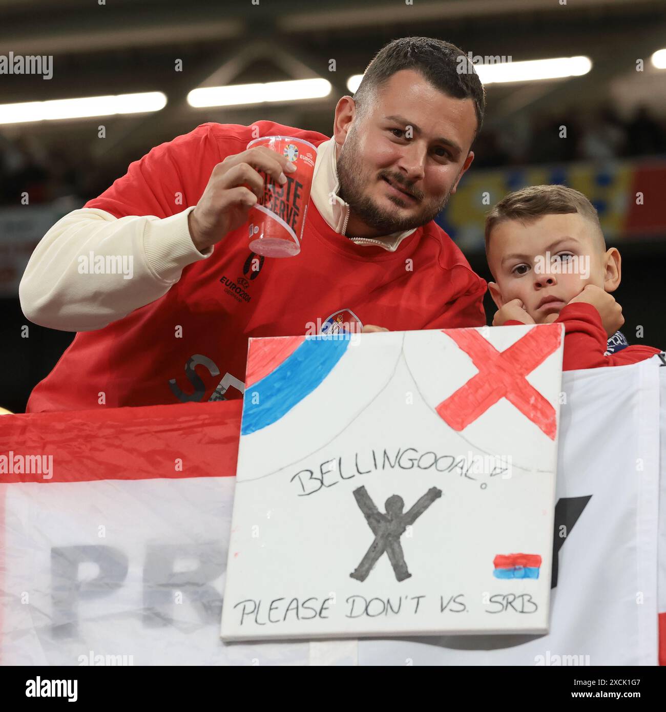 Gelsenkirchen, Germany. 16th June, 2024. Serbia fans hold up a placard ...