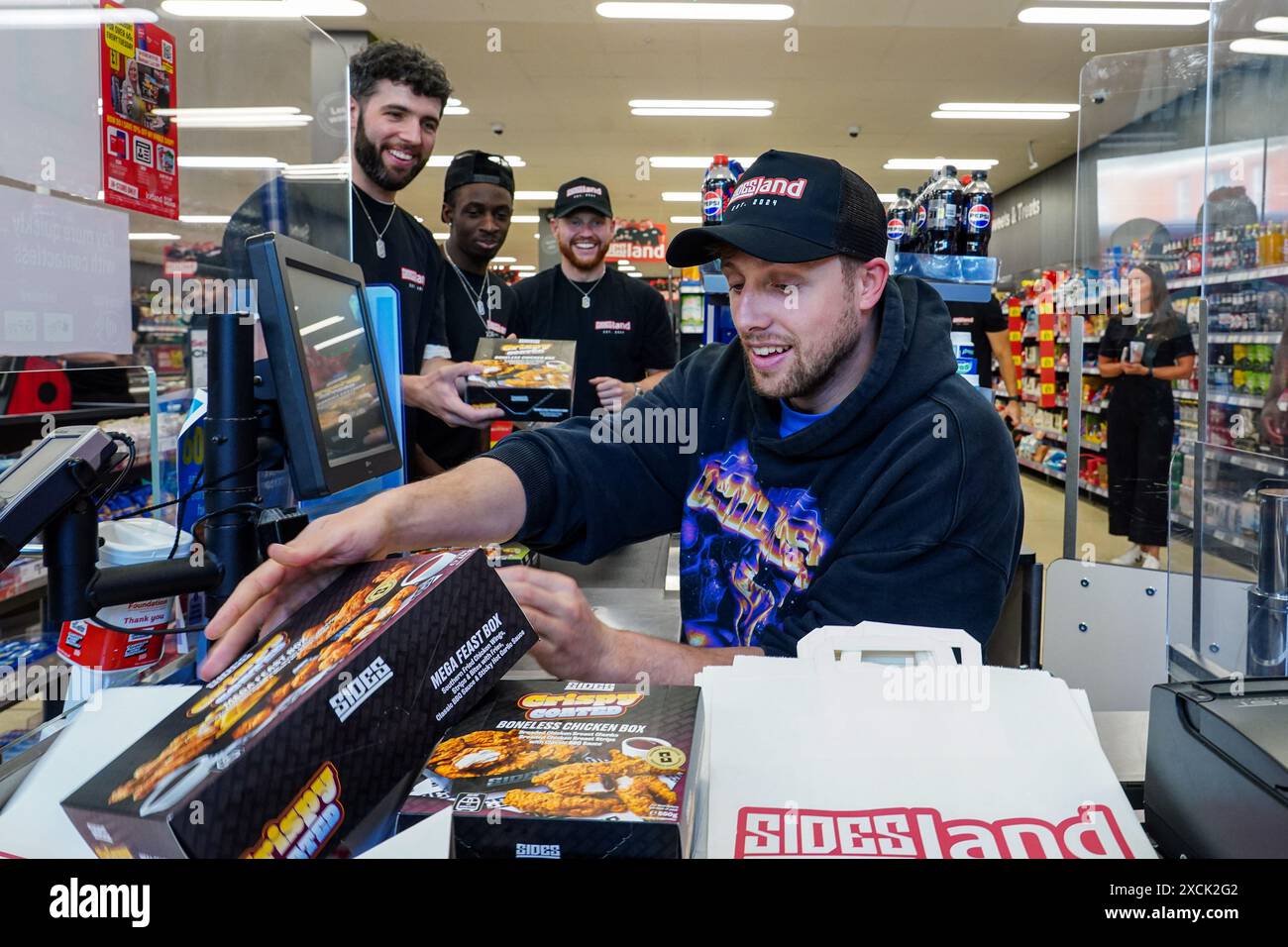 EDITORIAL USE ONLY (Left to right) Sidemen Joshua Bradley, Tobit Brown ...