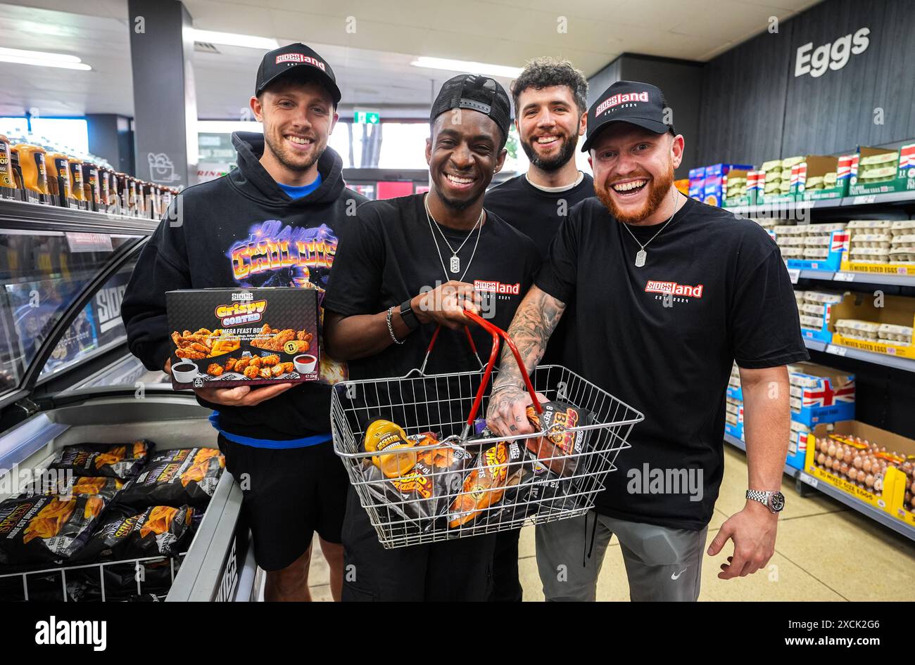 EDITORIAL USE ONLY (Left to right) Sidemen Harry Lewis, Tobit Brown ...