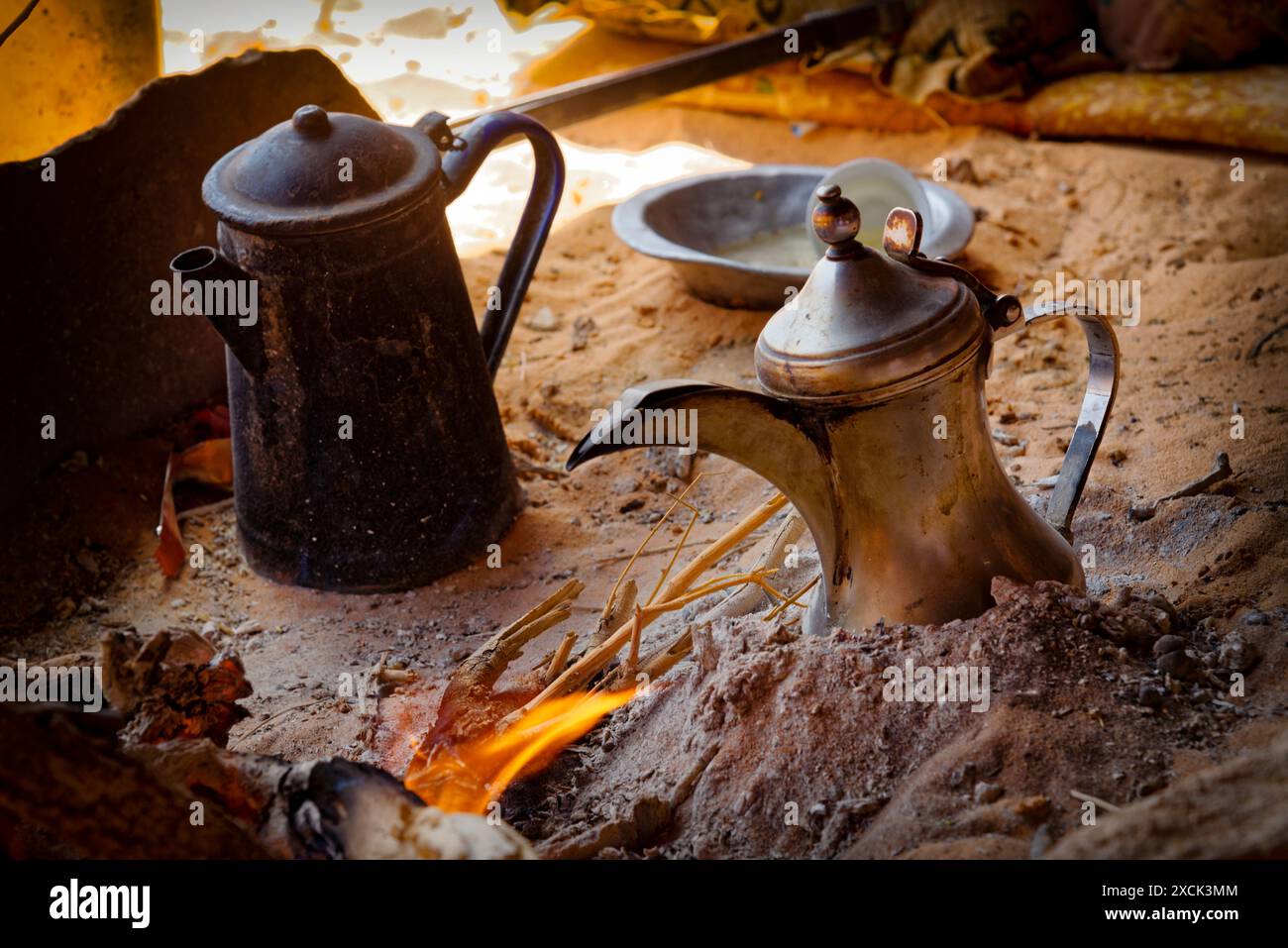 Preparing tea in desert, Jordan Stock Photo - Alamy