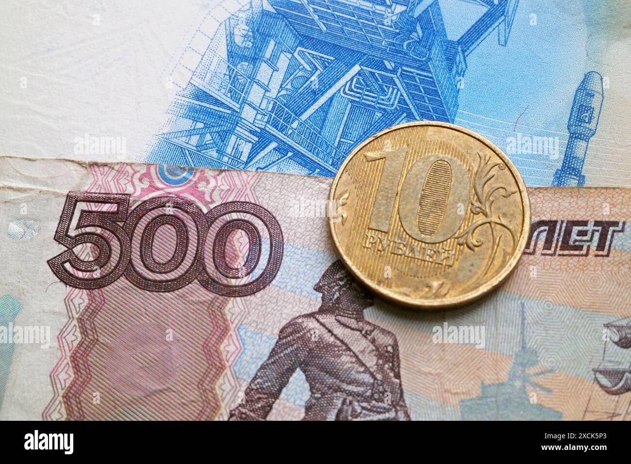 Russian ruble coin and banknotes as background Stock Photo - Alamy