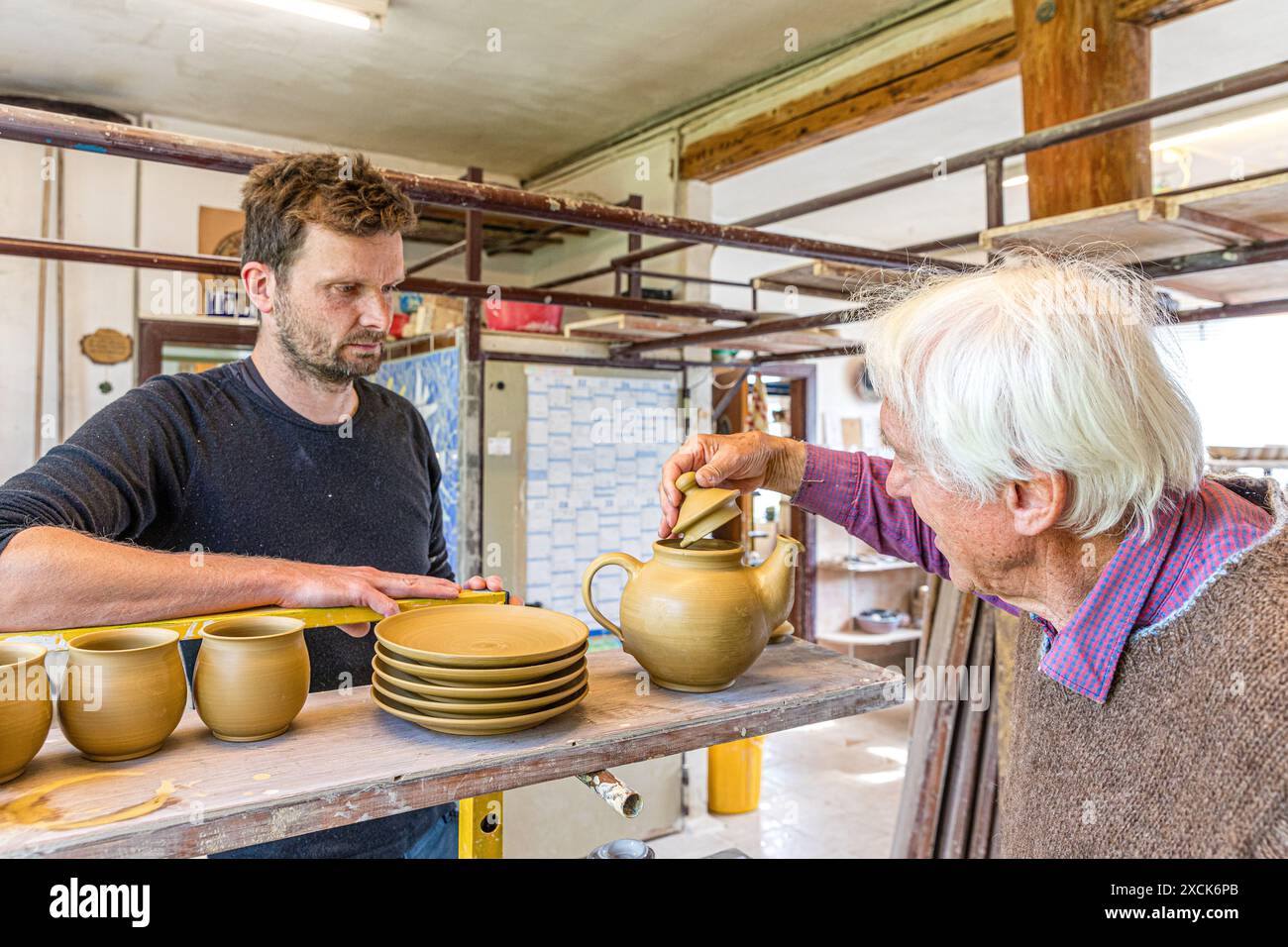 Kappeln, Germany. 14th June, 2024. Carsten Mildner (l), apprentice, and ...