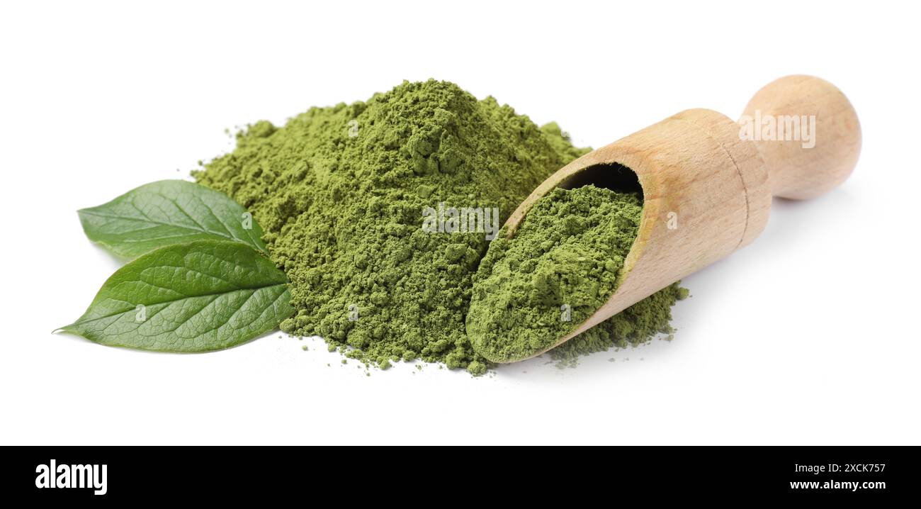 Pile of green matcha powder, scoop and leaves isolated on white Stock ...