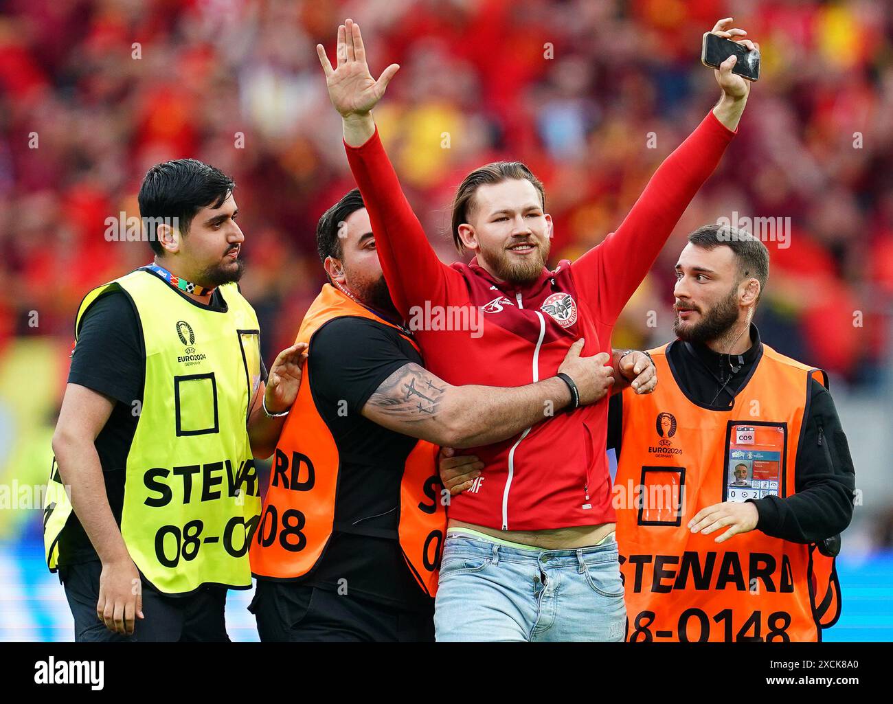 Streaker is led off the pitch hi-res stock photography and images - Alamy