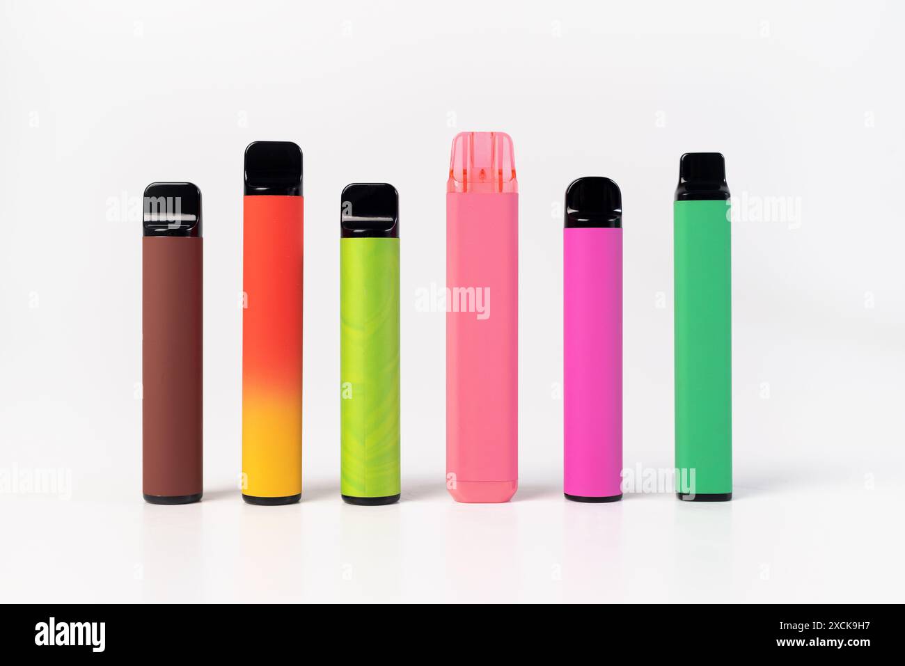 A set of colorful disposable electronic cigarettes of different shapes ...