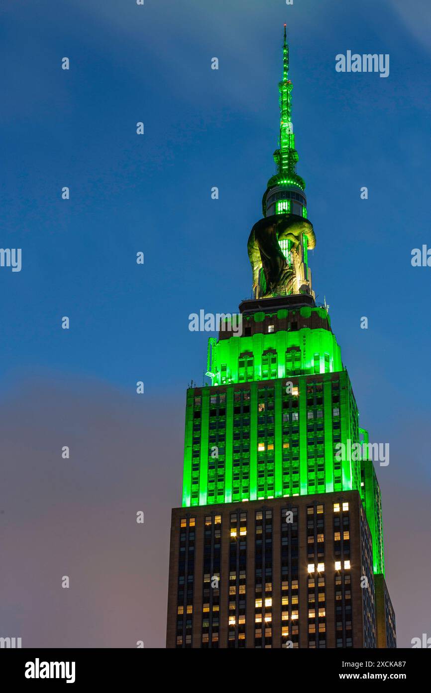 Giant Dragon balloon curls around the Empire State Building advertising ...