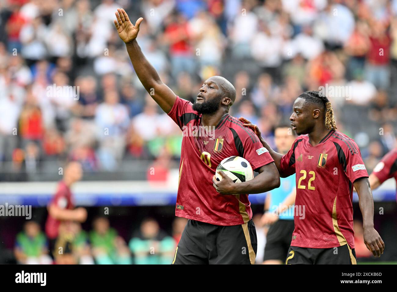 Romelu Lukaku (10) of Belgium celebrates with Jeremy Doku (22) of ...