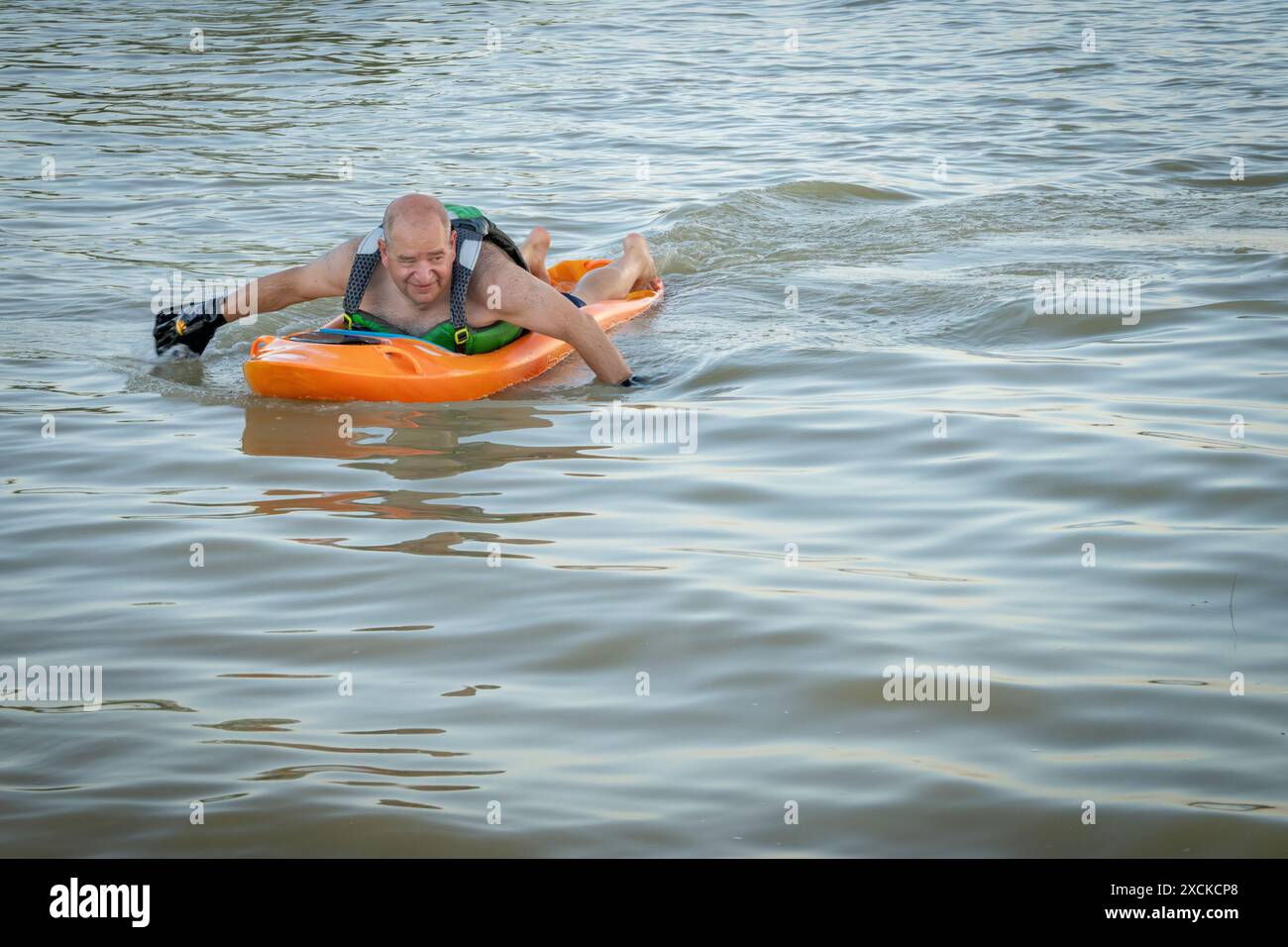 Loveland, CO, USA - June 16, 2024: Bellyak, prone kayak at lake shore ...
