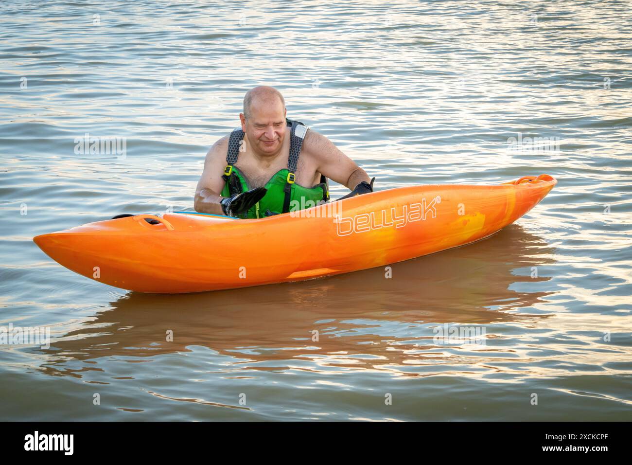 Loveland, CO, USA - June 16, 2024: Bellyak, prone kayak at lake shore ...
