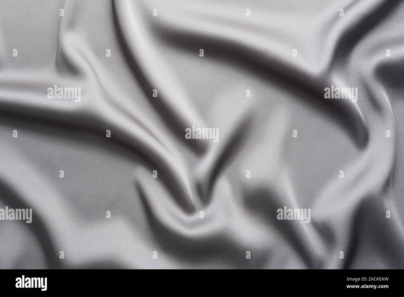 Texture of beautiful light grey silk fabric as background, closeup ...